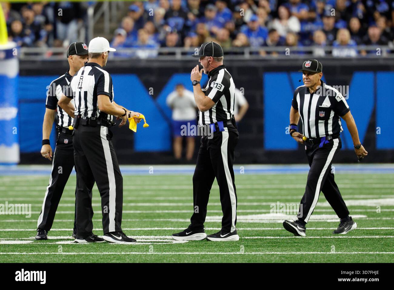 Officials on the field during an NFL football game between the Detroit ...