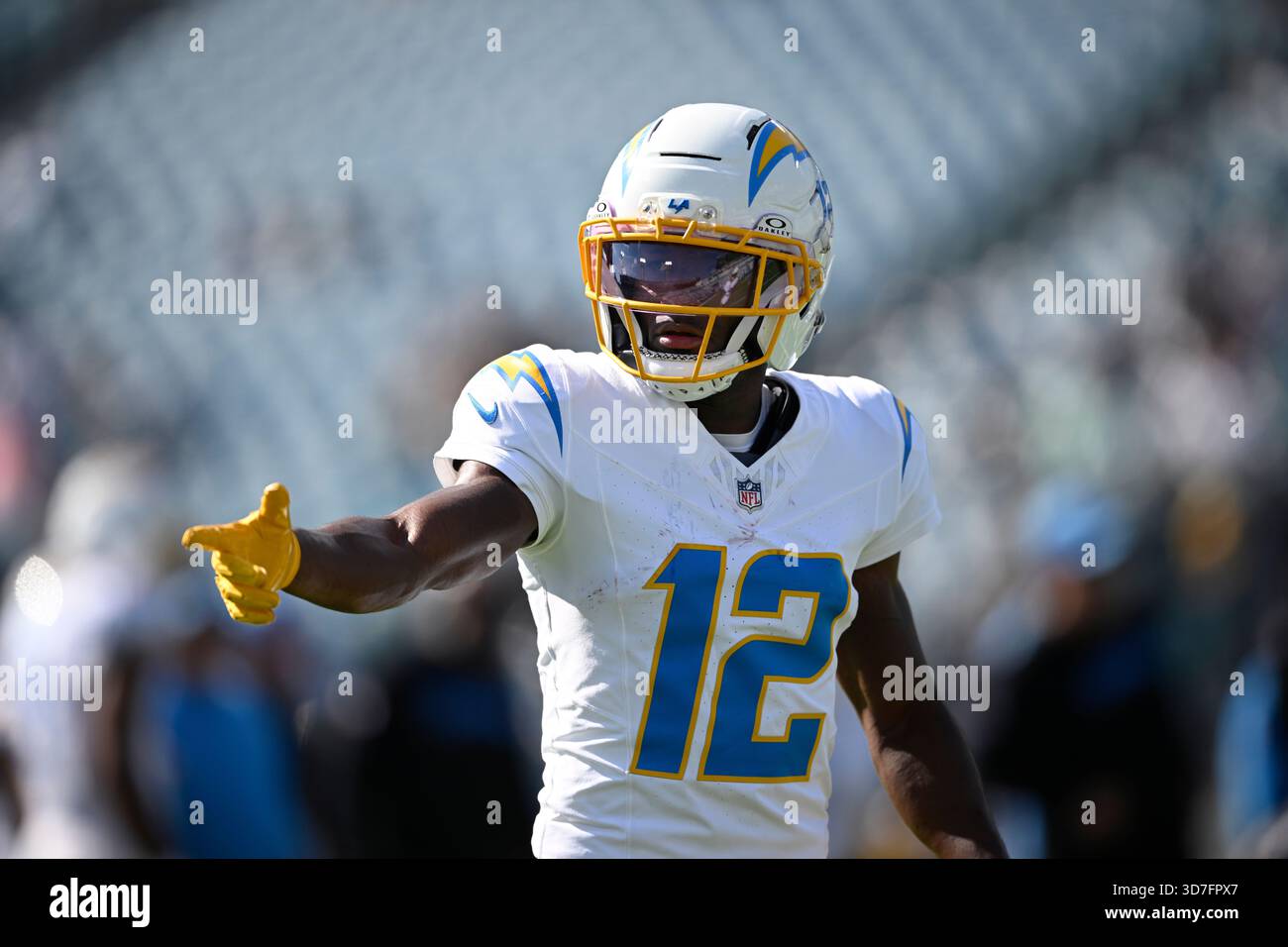 Los Angeles Chargers wide receiver Derius Davis (12) warms up before an ...