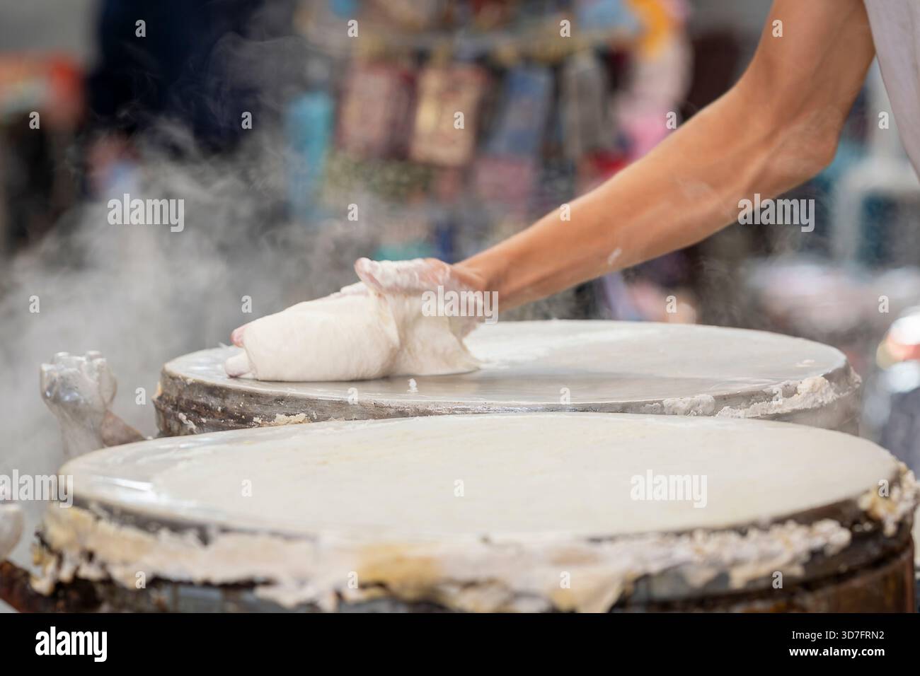 Skillful bastilla maker making bastilla sheets. Close-up of the ...
