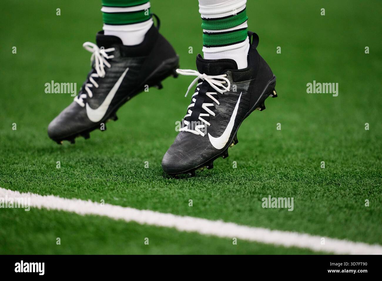 The cleats of Philadelphia Eagles linebacker Zack Baun are shown as he ...