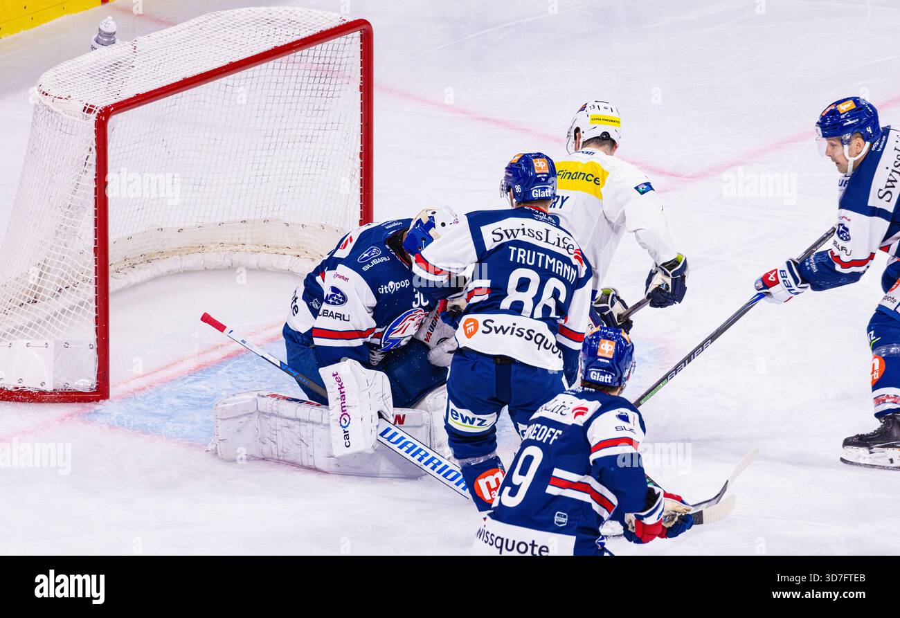 Zurich, Switzerland, 25th Nov 2025: #13 Manix Landry (Ambri) with a ...