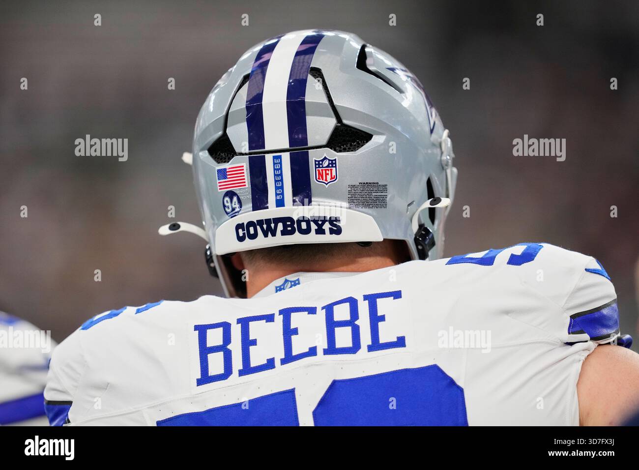 Dallas Cowboys center Cooper Beebe wears a sticker on his helmet ...