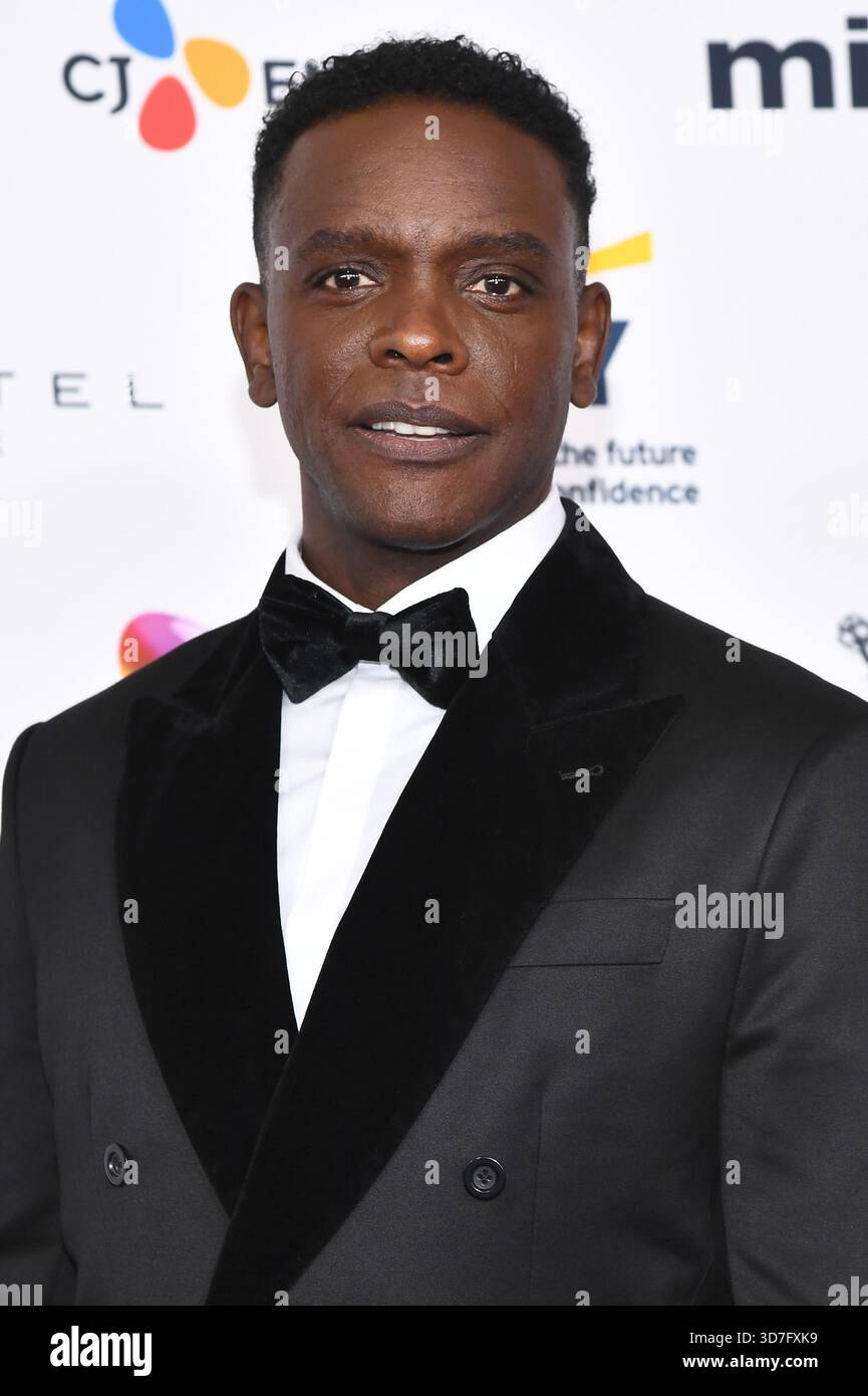 Chris Chalk walking the red carpet at the 53rd International Emmy ...