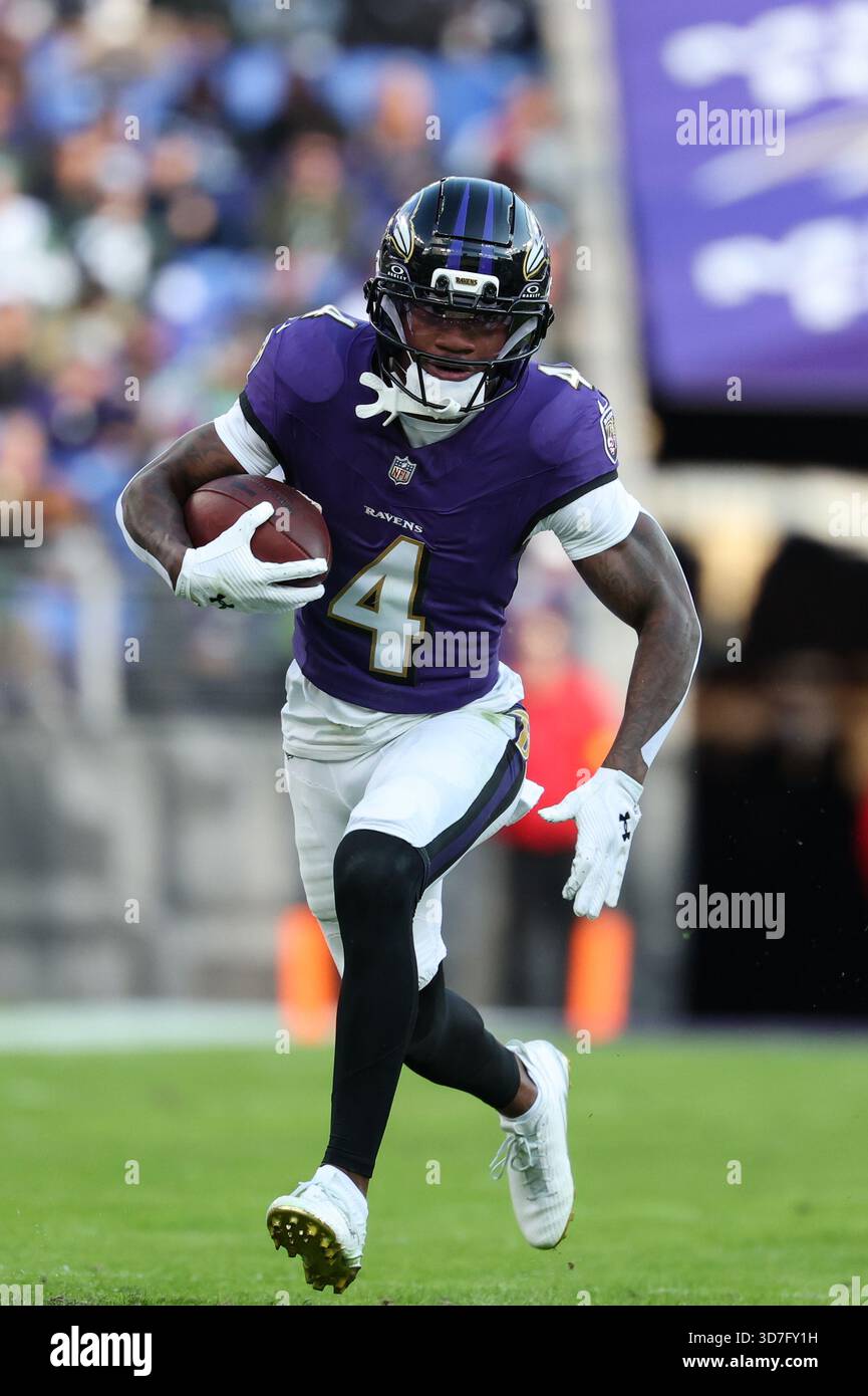 Baltimore Ravens wide receiver Zay Flowers (4) runs the ball during the ...