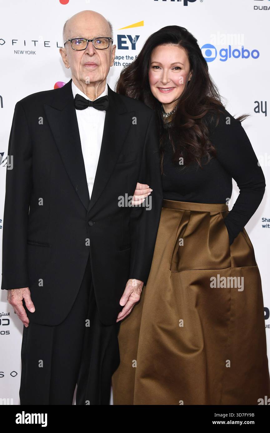 (L-R) Bruce Paisner and Camille Bidermann walking the red carpet at the ...
