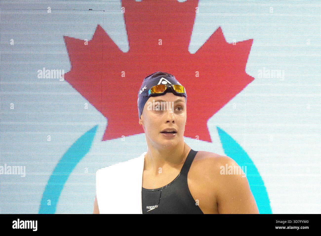 Penny Oleksiak reacts after competing in the 100m freestyle at the ...