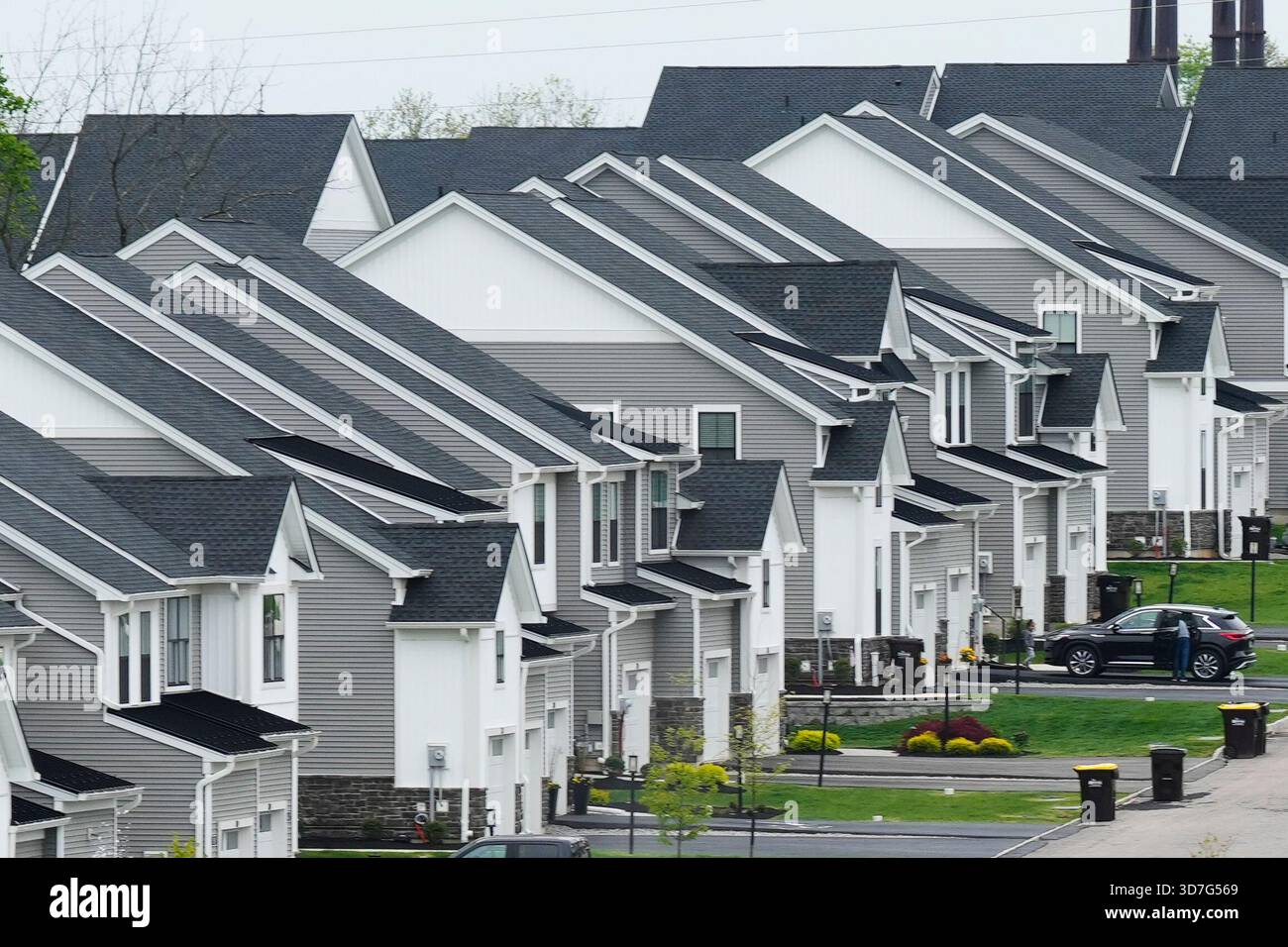 FILE - Newly developed homes sit in a row in Eagleville, Pa., April 28 ...