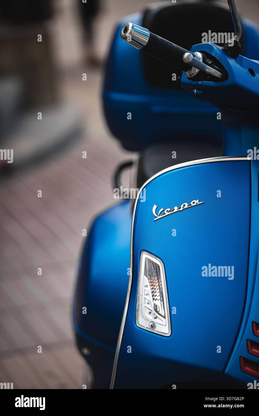 Close-up details of a blue Vespa scooter — a timeless icon of Italian ...