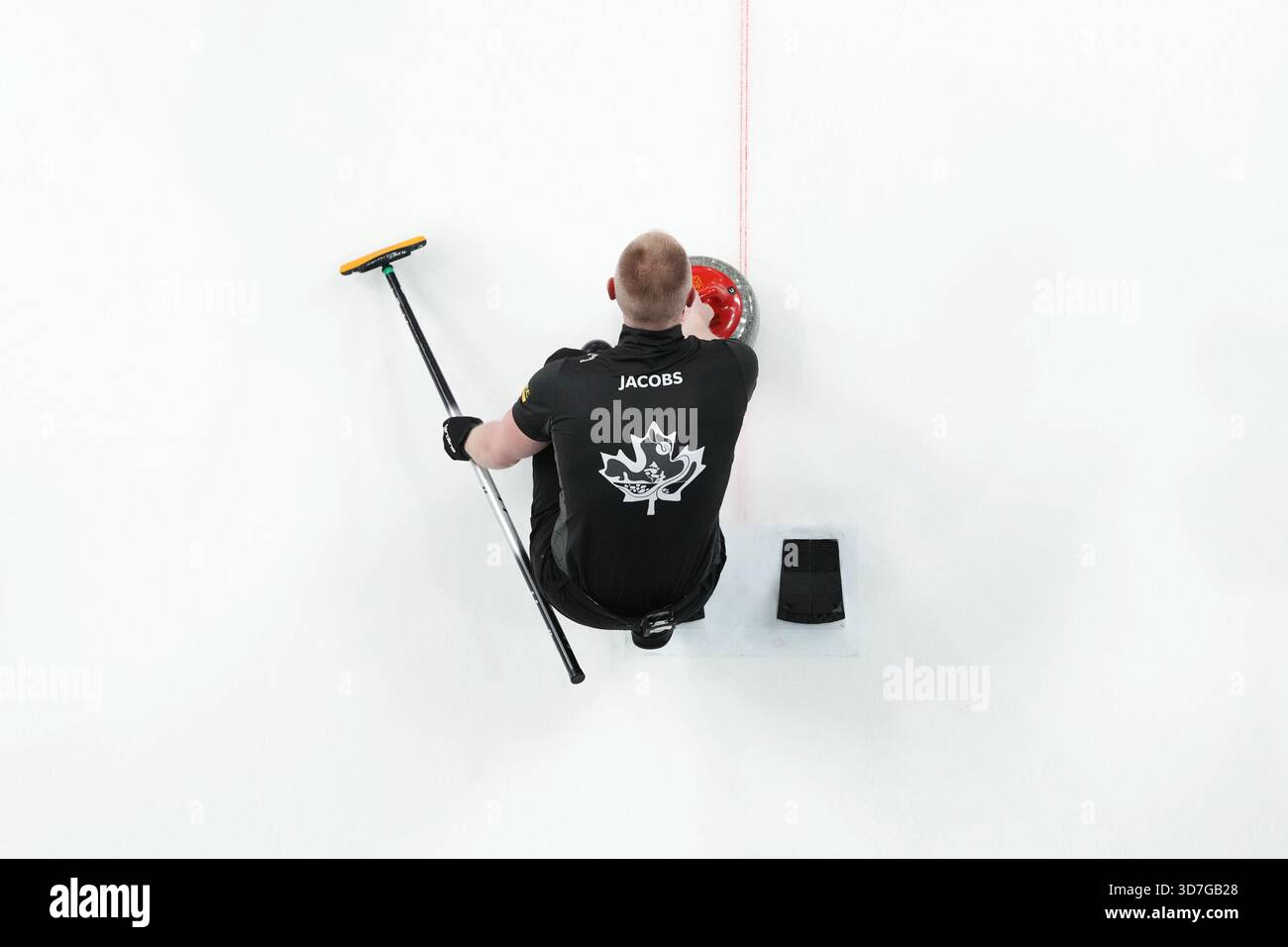 Brad Jacobs prepares to throw a rock during Canadian Olympic curling ...