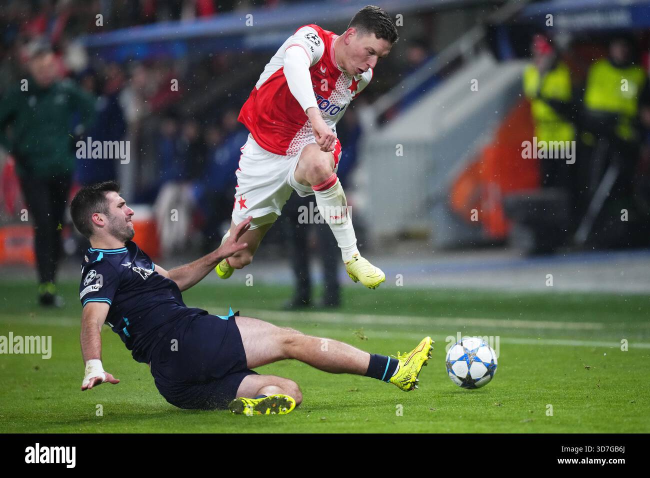 Slavia's Lukas Provod, center, duels for the ball with Athletic Bilbao ...