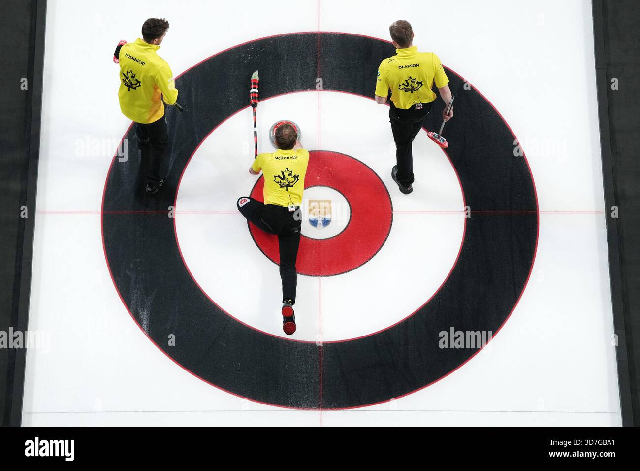Jordon McDonald throws a rock during Canadian Olympic curling trials ...