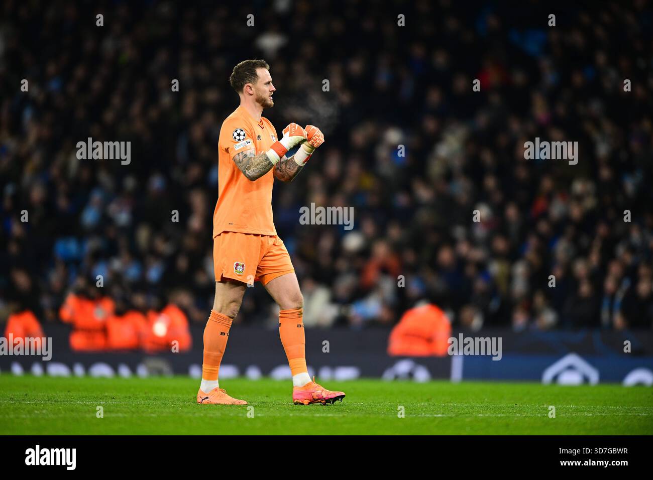 Mark Flekken of Bayer Leverkusen celebrates as his team score the ...