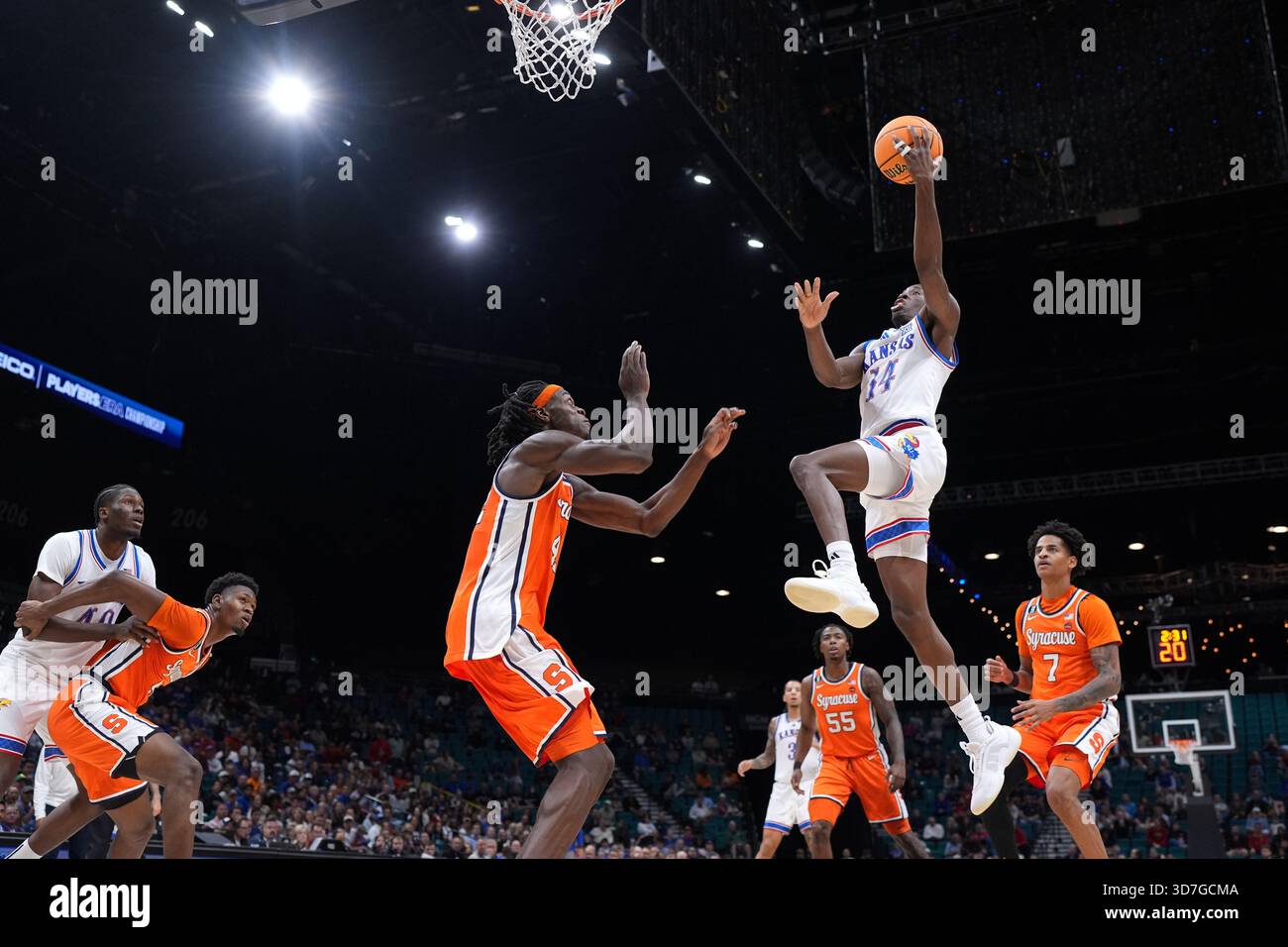Kansas guard Melvin Council Jr. (14) drives to the basket against ...