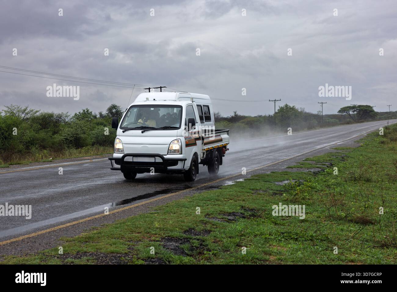 pickup truck designed for commercial use , on an open road in the heavy ...