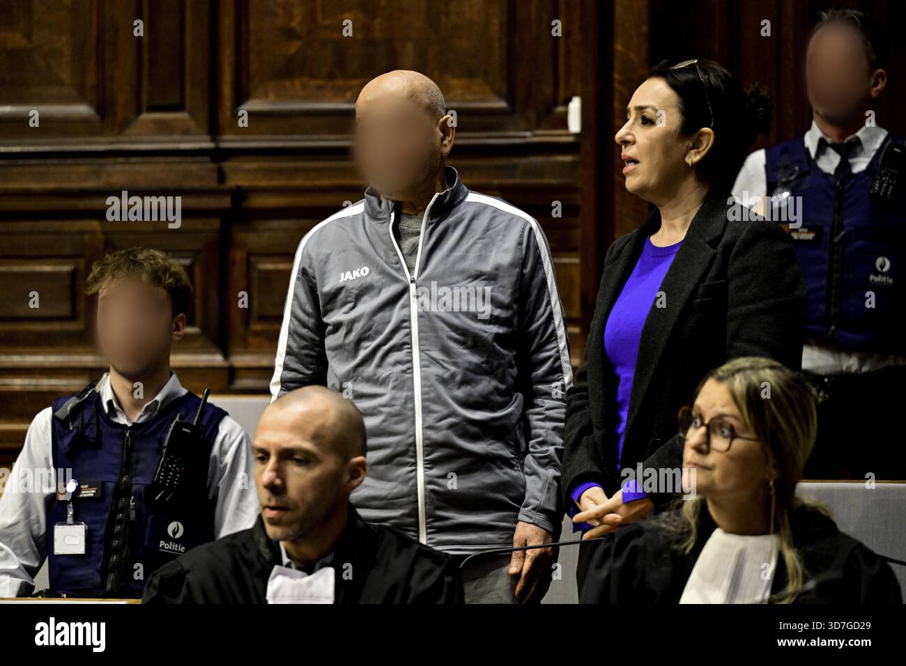 Accused A. Zannahi, Lawyer Tim Smet and Lawyer Evelien Jacobs pictured ...