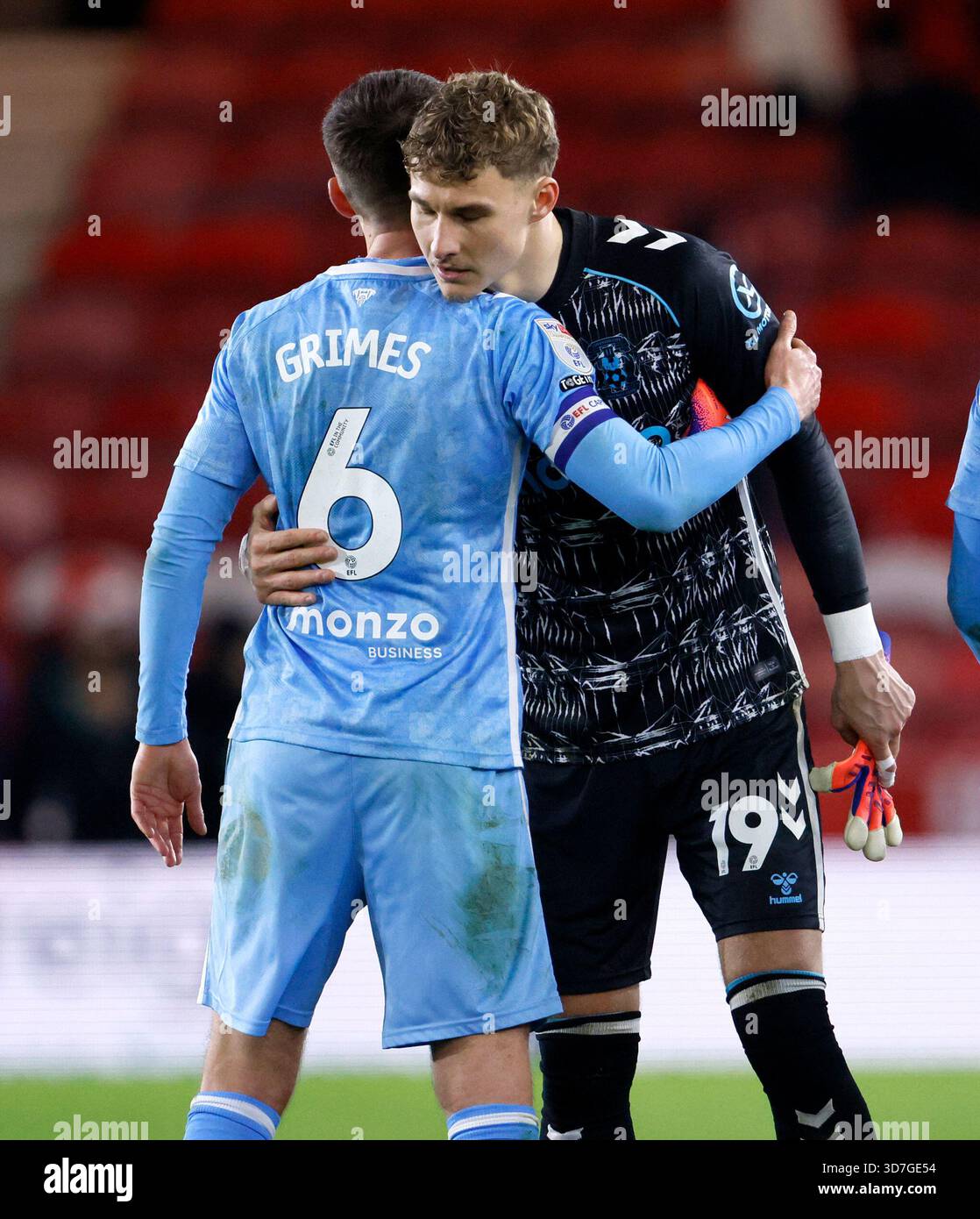 Coventry City's Matt Grimes (left) and Coventry City goalkeeper Carl ...