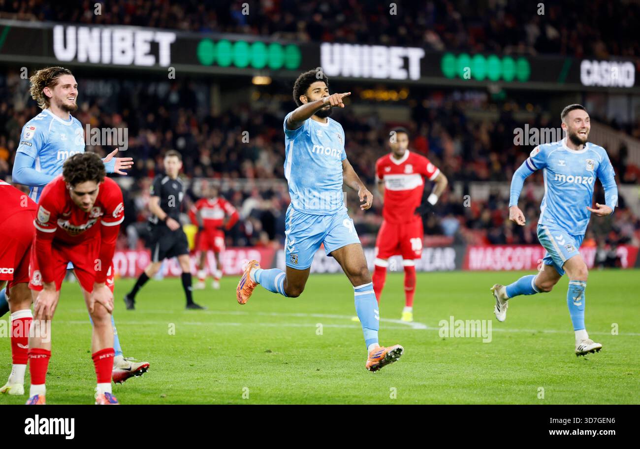 Coventry City's Ellis Simms (centre) celebrates after scoring his sides ...
