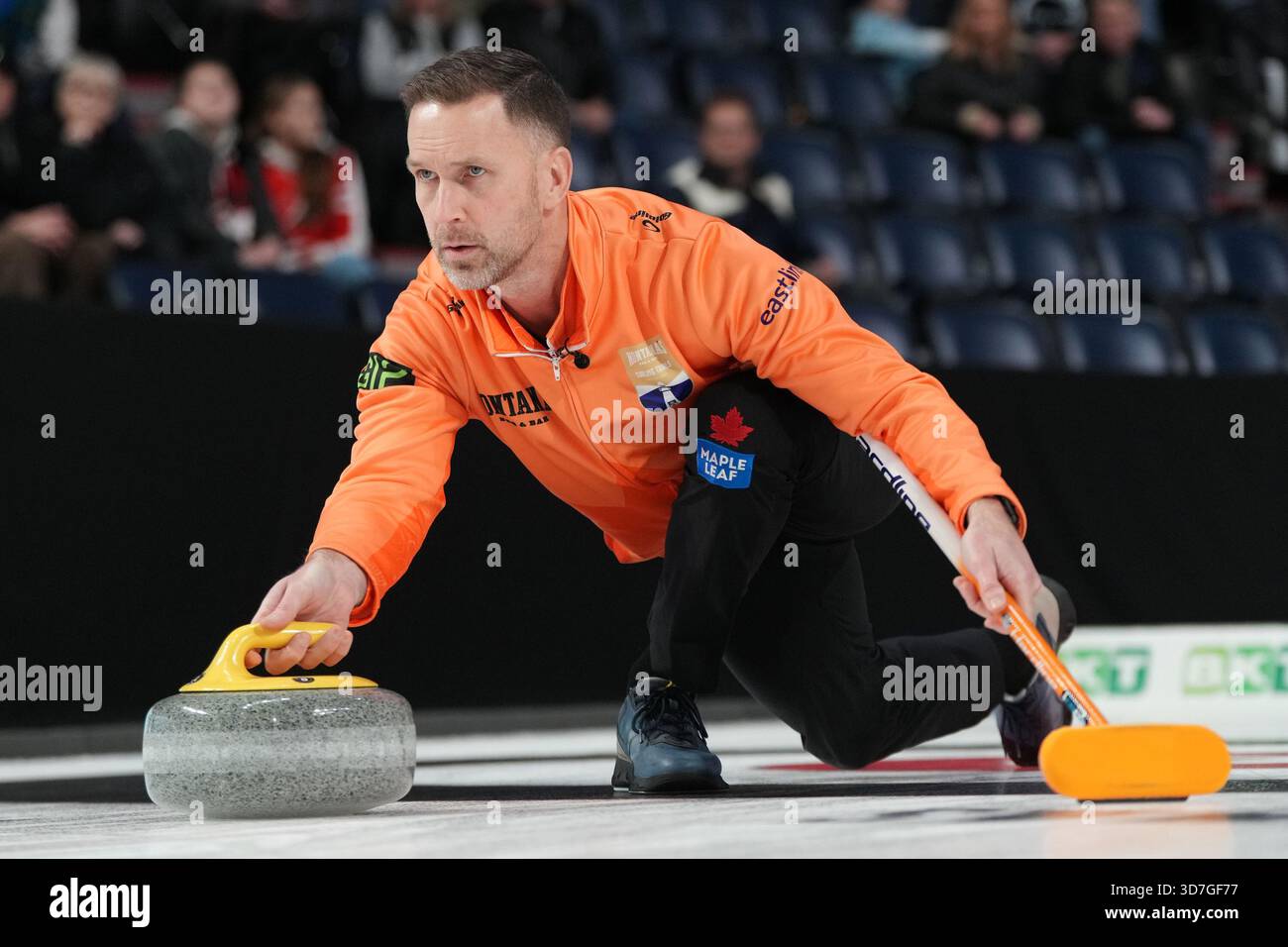 Brad Gushue throws a rock during Canadian Olympic curling trials action ...