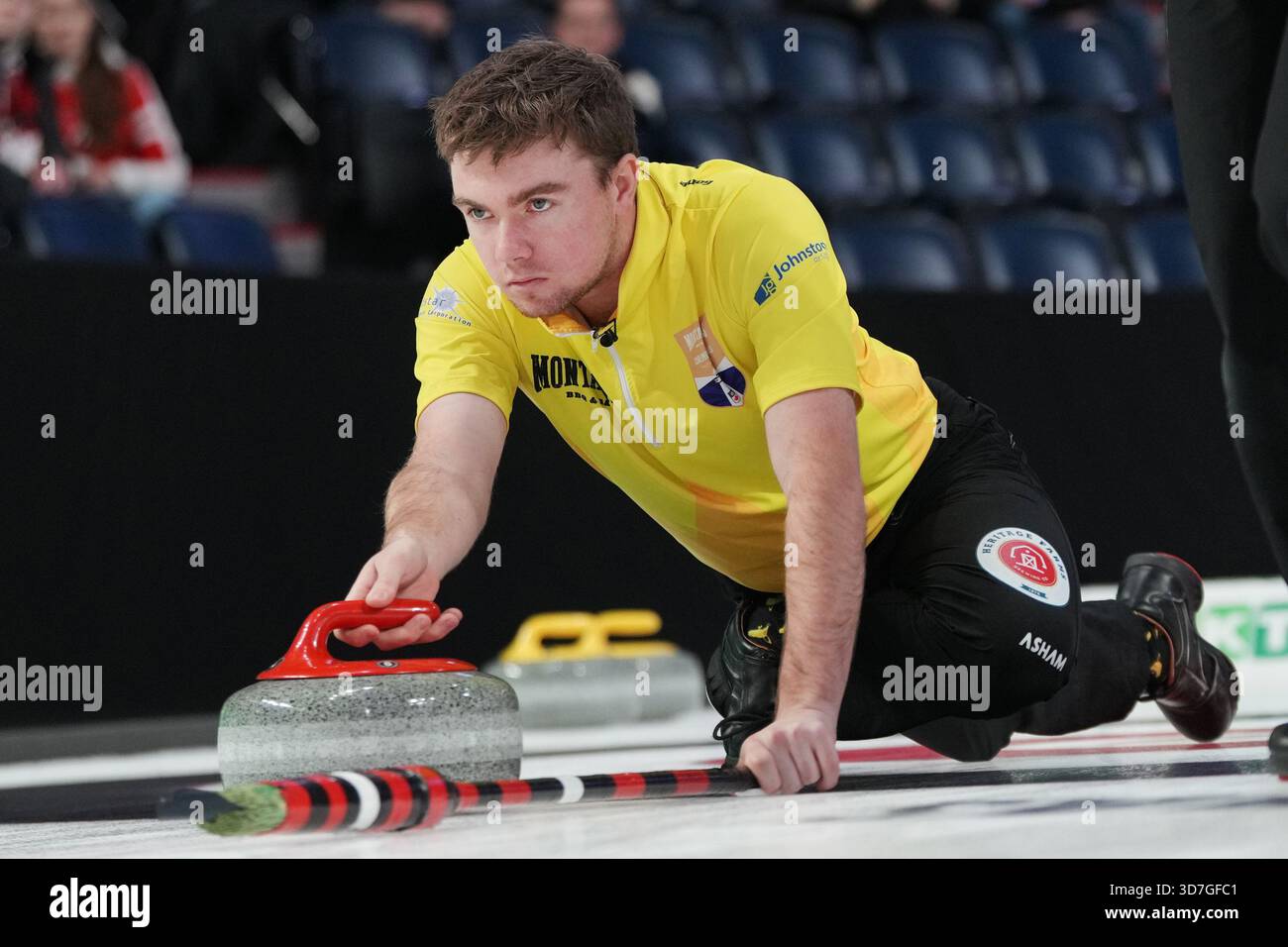 Jordon McDonald throws a rock during Canadian Olympic curling trials ...