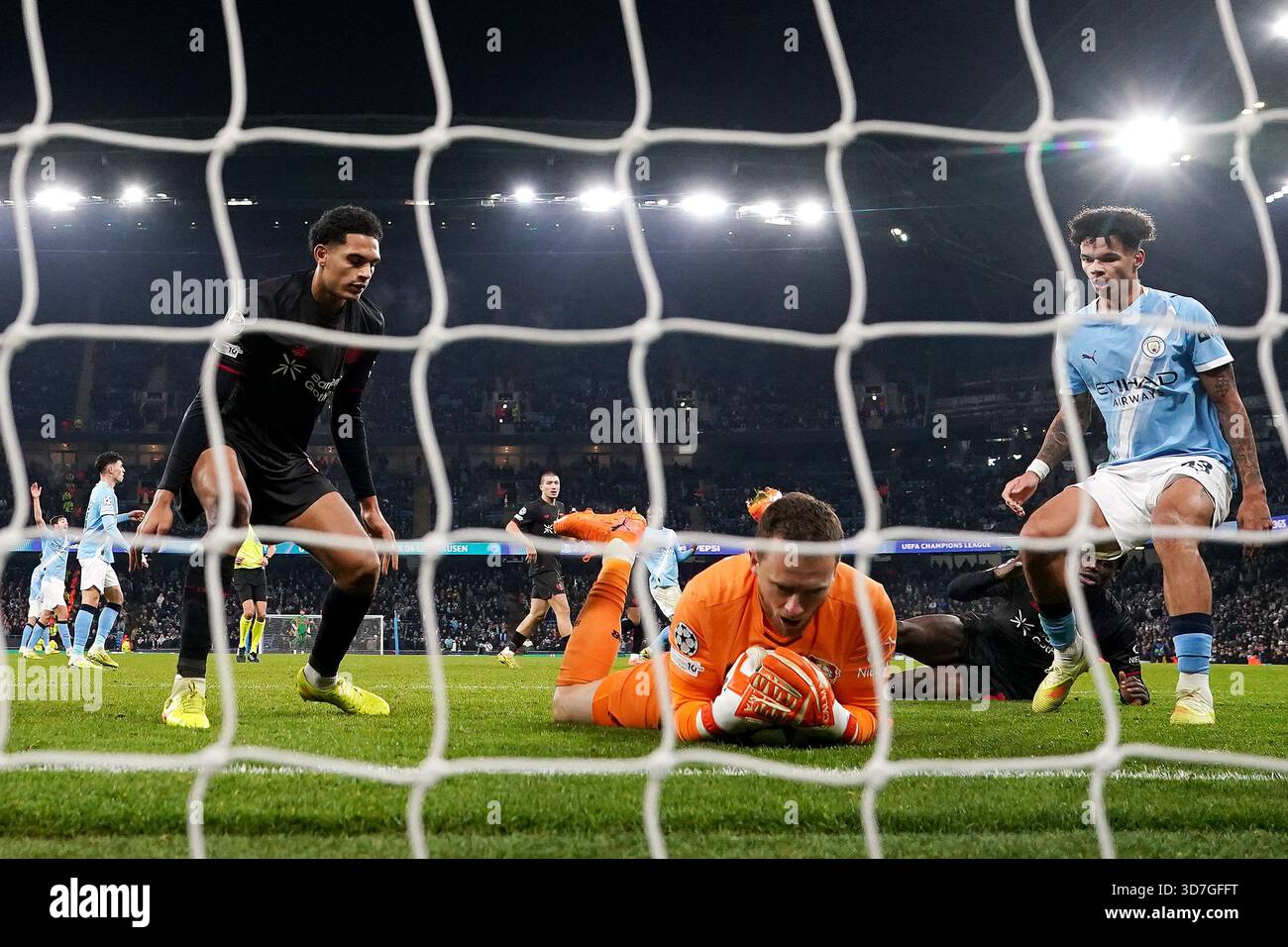 Bayer Leverkusen goalkeeper Mark Flekken makes a save during the UEFA ...