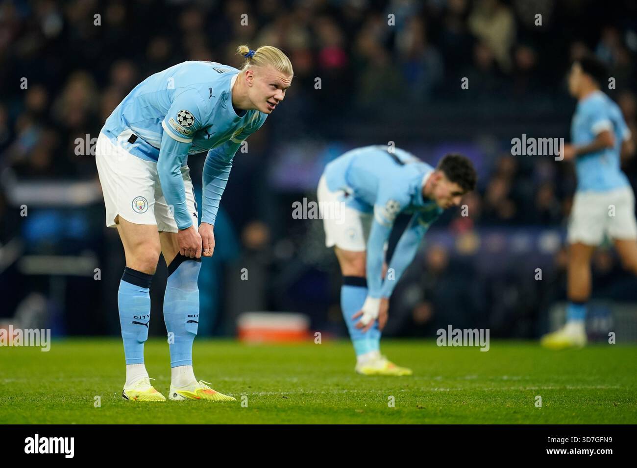 Manchester City's Erling Haaland pulls his sock up during the Champions ...