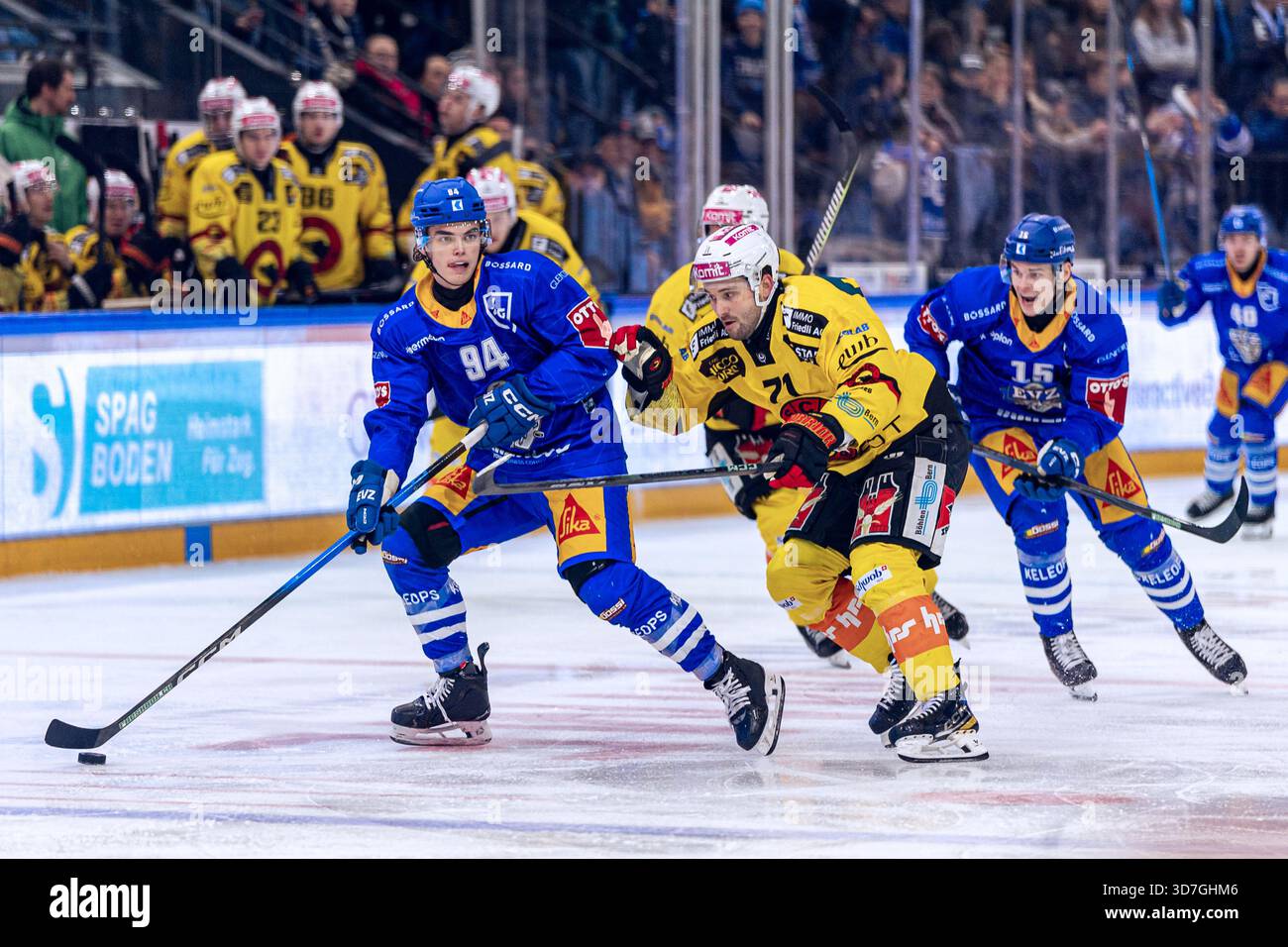 Nic Balestra #94 (EV Zug) is chased by Emil Bemstrom #71 (SC Bern) - November 25, 2025 ...