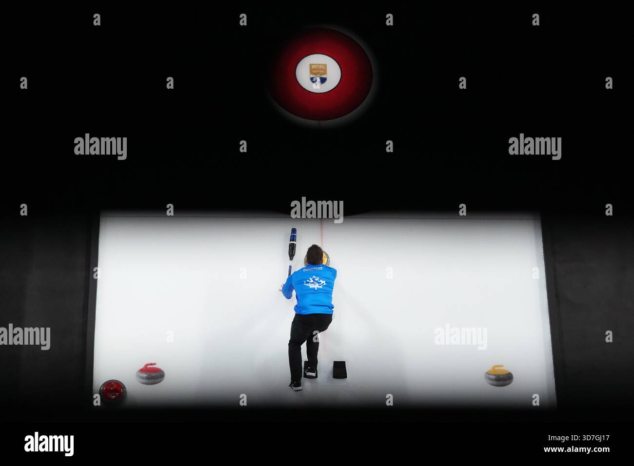 Matt Dunstone prepares to throw a rock during Canadian Olympic curling ...