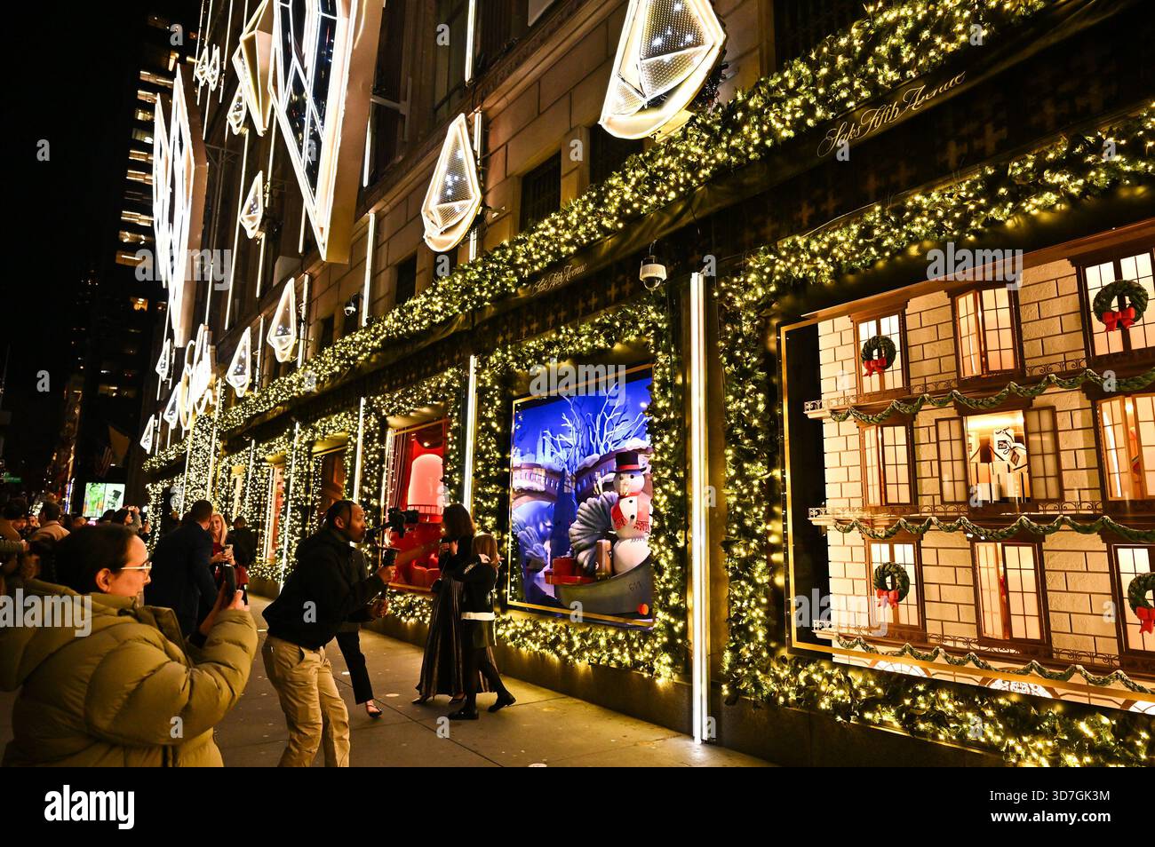 Saks Fifth Avenue holiday light show and window reveal on Monday, Nov ...