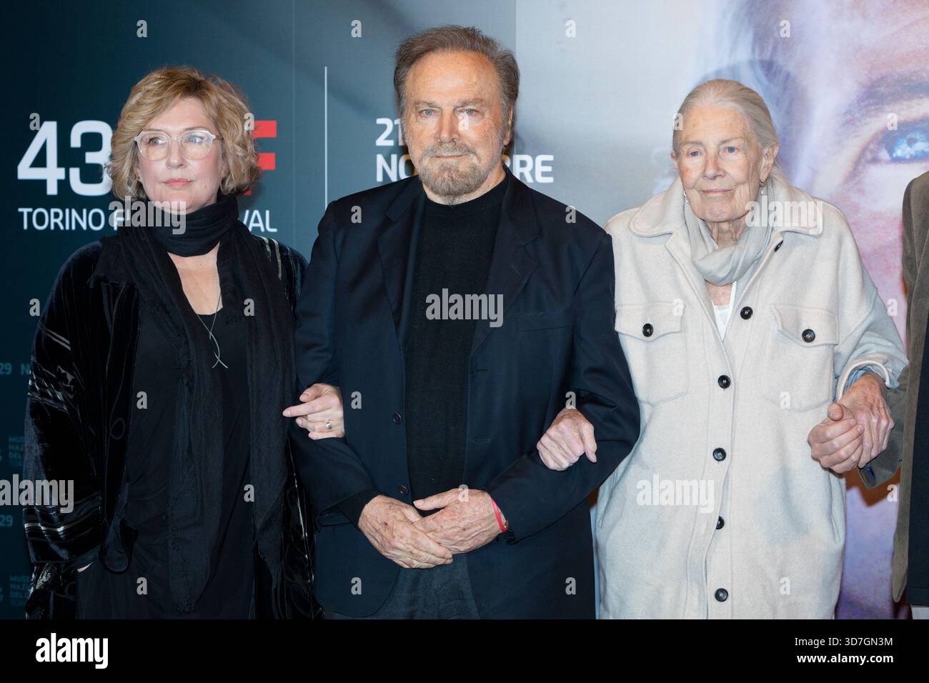Turin, Italy. 25th Nov, 2025. Actors Franco Nero (center) and Vanessa ...
