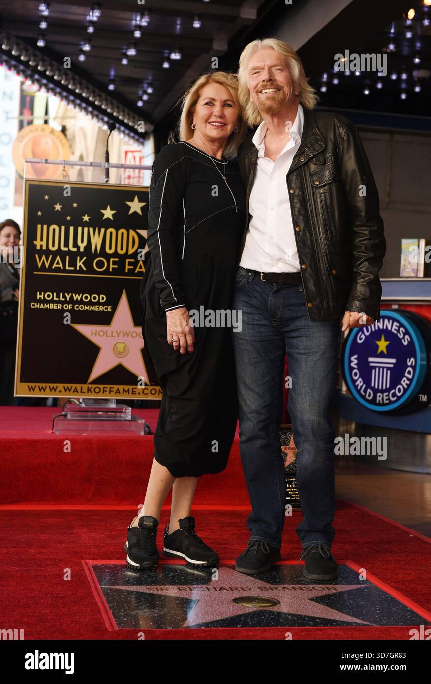 FILE - British business magnate Richard Branson, right, appears with ...