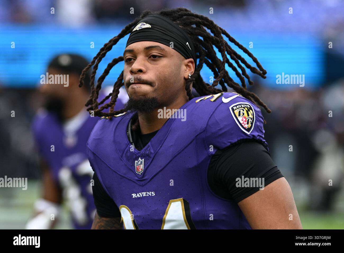 Baltimore Ravens running back Keaton Mitchell (34) warms up before an ...