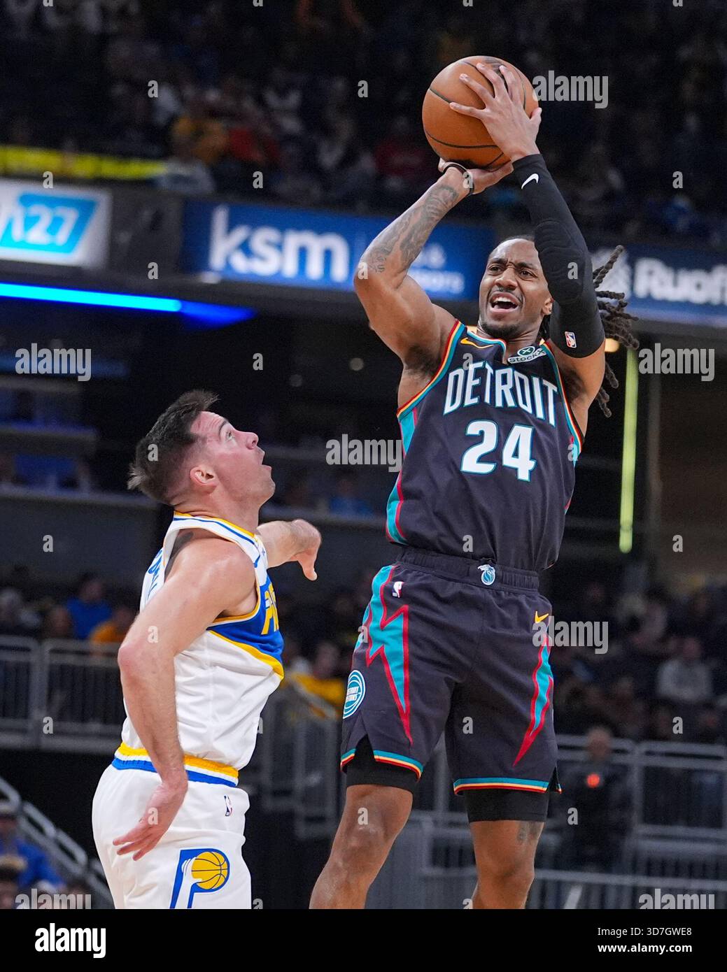 Detroit Pistons guard Daniss Jenkins (24) shoots over Indiana Pacers ...