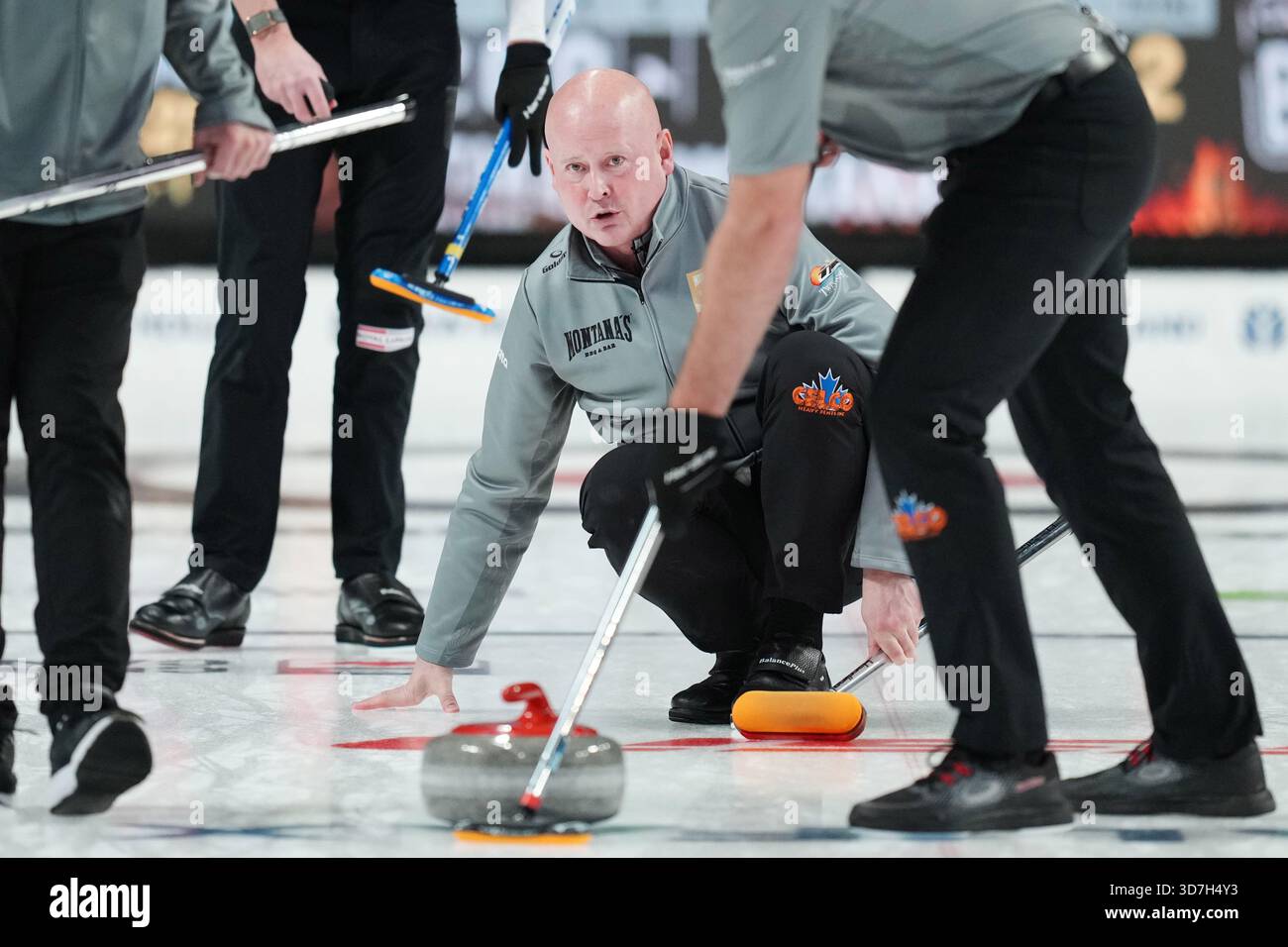 Kevin Koe throws a rock during Canadian Olympic curling trials action ...