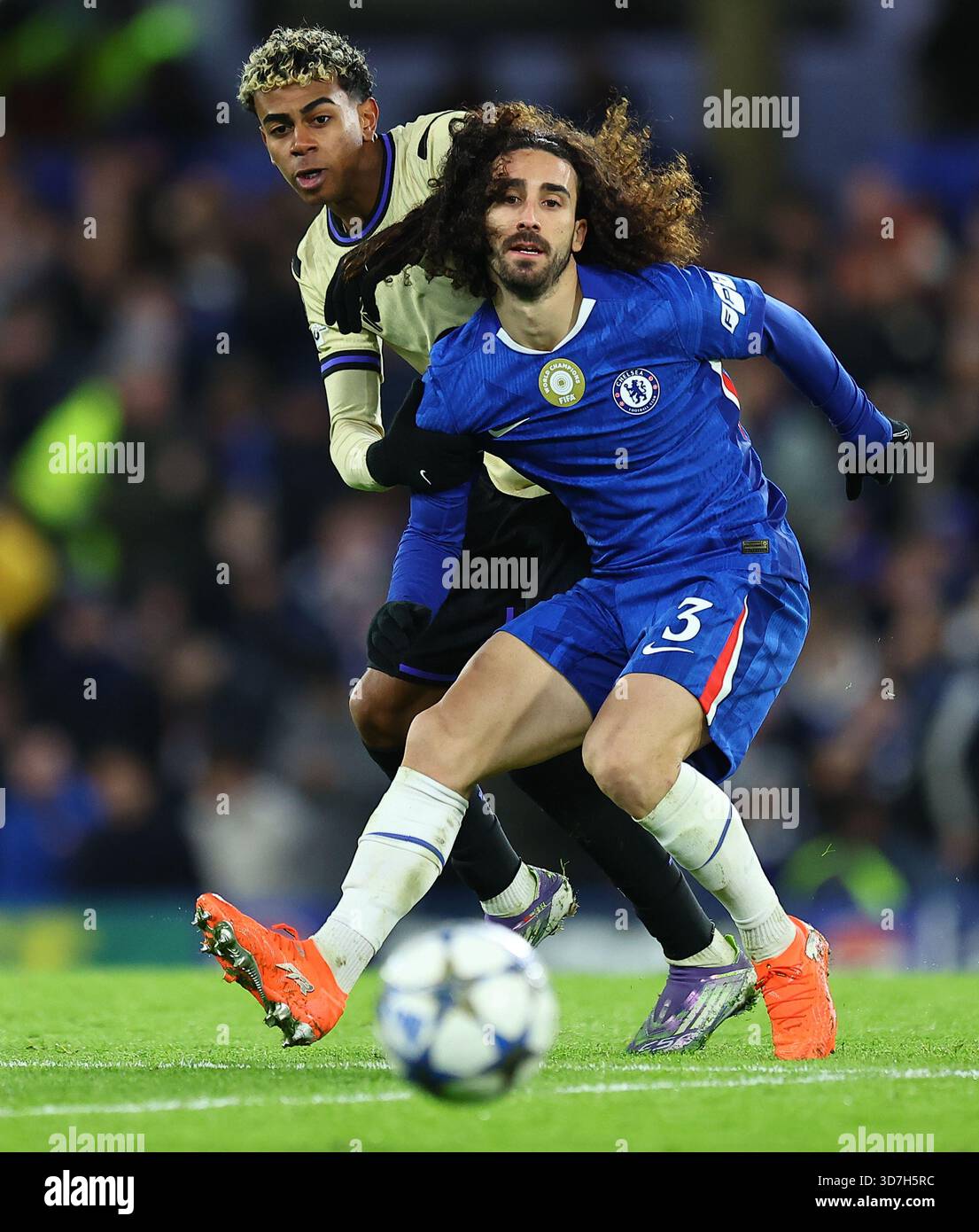 Marc Cucurella of Chelsea and Robert Lewandowski of Barcelona during ...