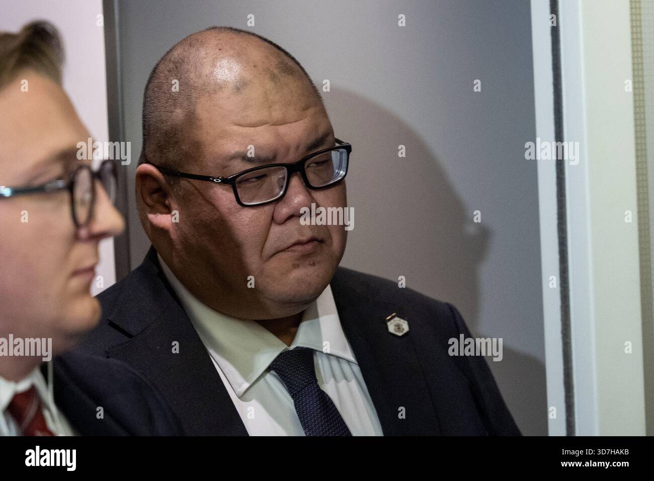 White House communications director Steven Cheung listens as President ...