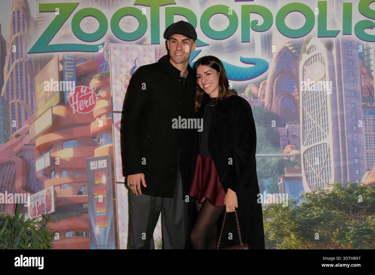 Gianluca Mancini (l) and Elisa Baggiani (r) attend the Disney movie premiere Zootropolis 2 green ...