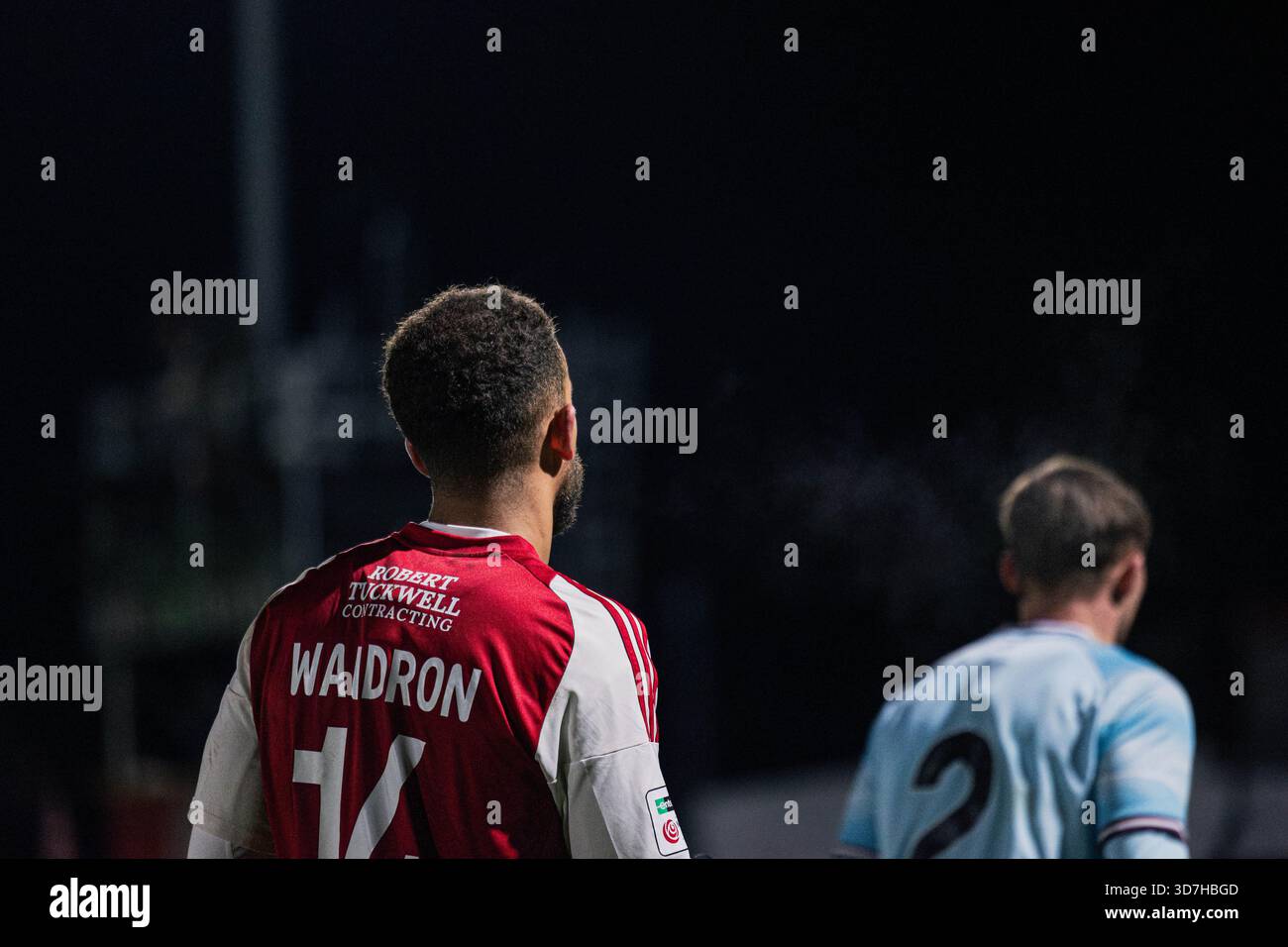 Brackley, UK. 25th Nov, 2025. Danny Waldron (14 Brackley Town) looks on ...