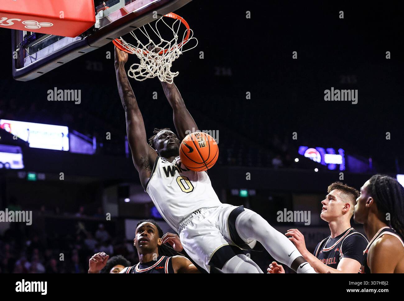 November 25, 2025: Wake Forest forward Omaha Biliew (0) dunks the ball ...