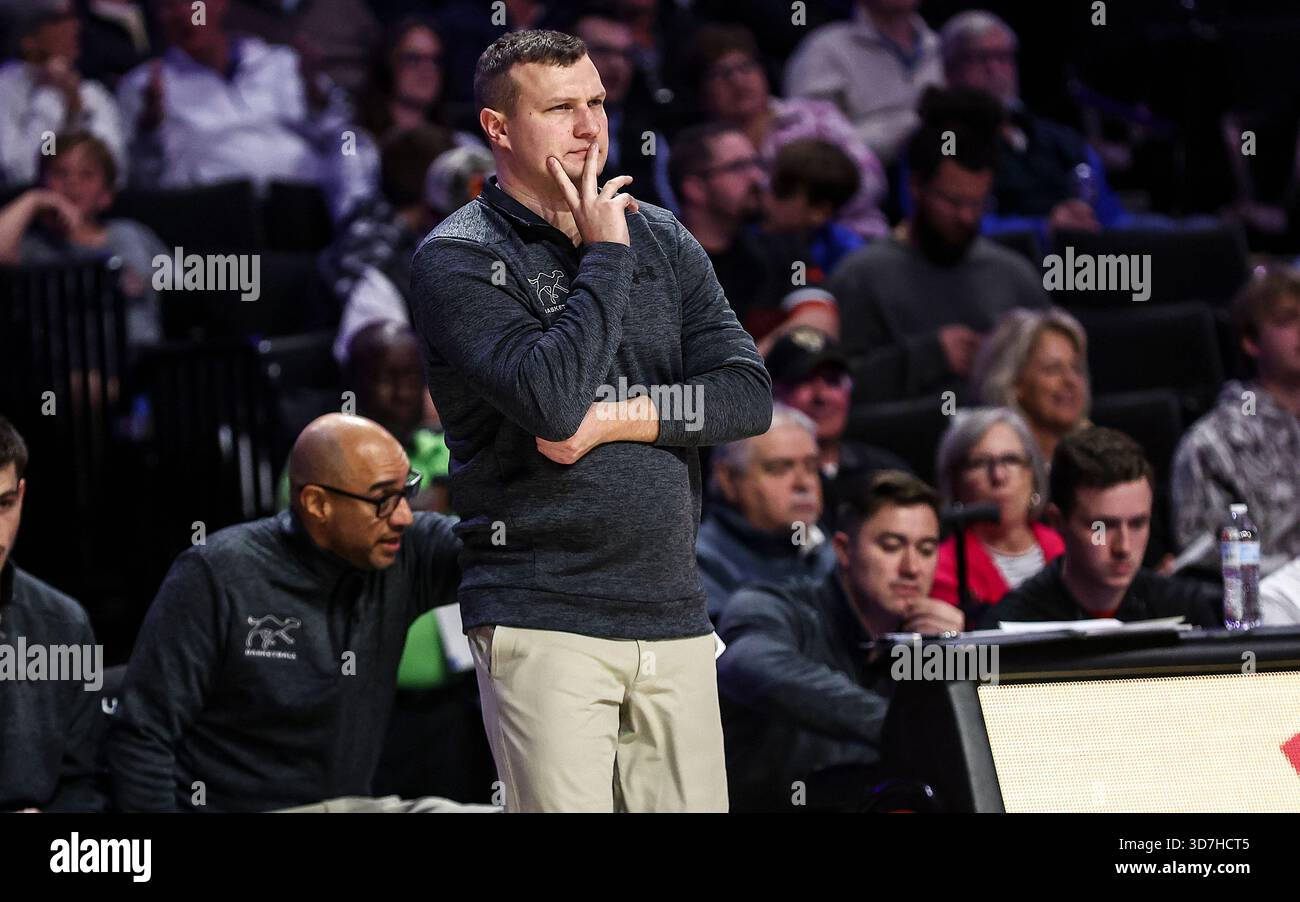 November 25, 2025: John Andrzejek is the head basketball coach for ...