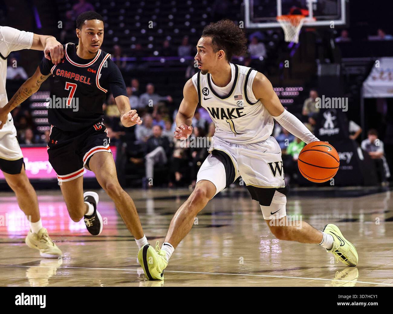 November 25, 2025: Wake Forest guard Nate Calmese (1) drives to the ...