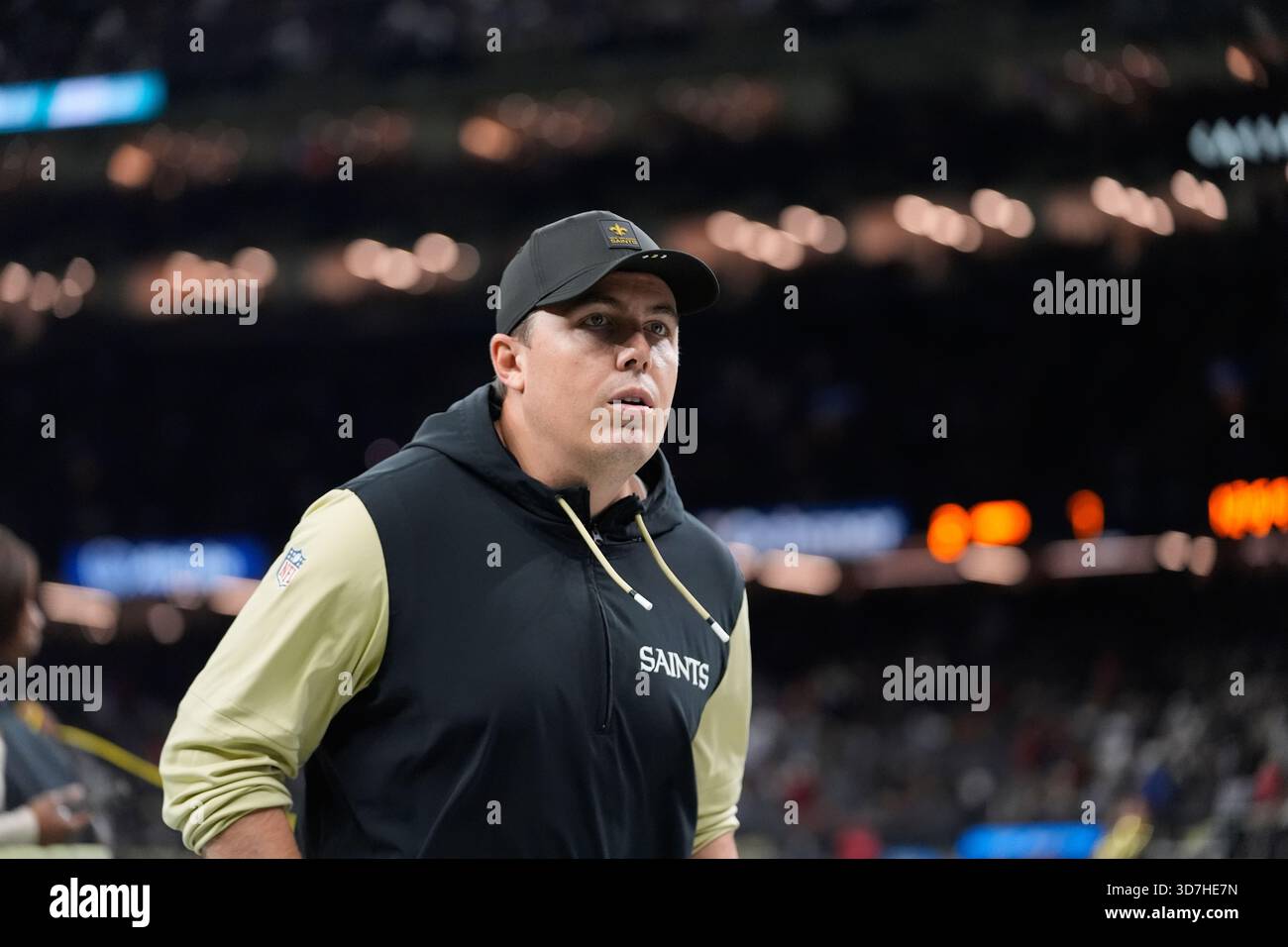 New Orleans Saints head coach Kellen Moore walks of the field for half ...