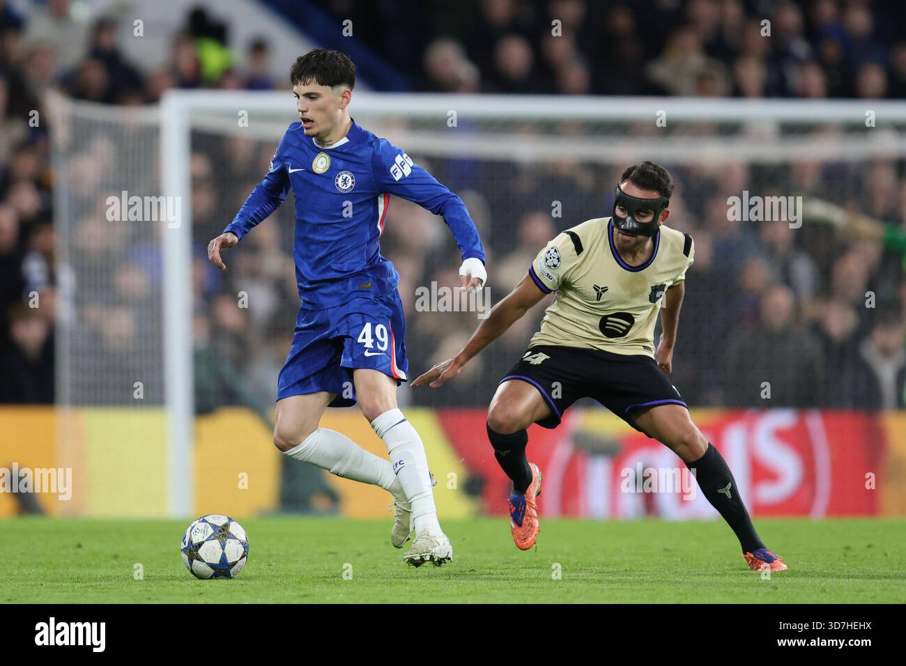 Alejandro Garnacho of Chelsea receives pressure from Eric Garcia of FC ...