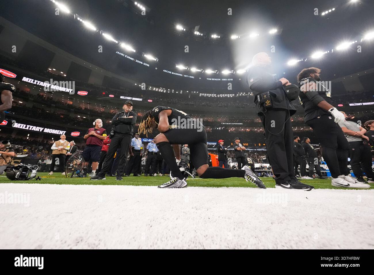 New Orleans Saints cornerback Quincy Riley (29) kneels in prayer before ...