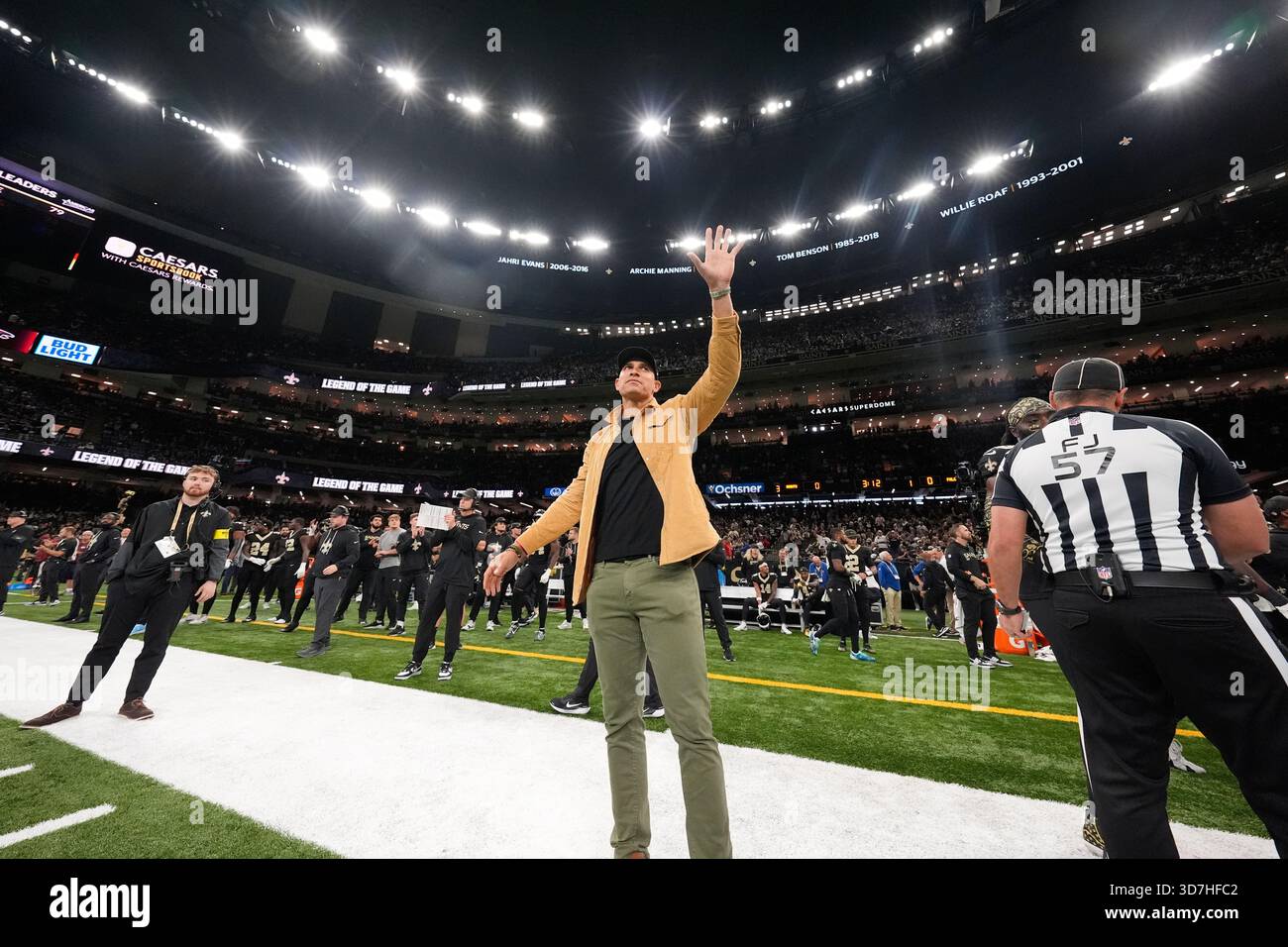 Former New Orleans Saints tight end Jimmy Graham holds acknowledges the ...