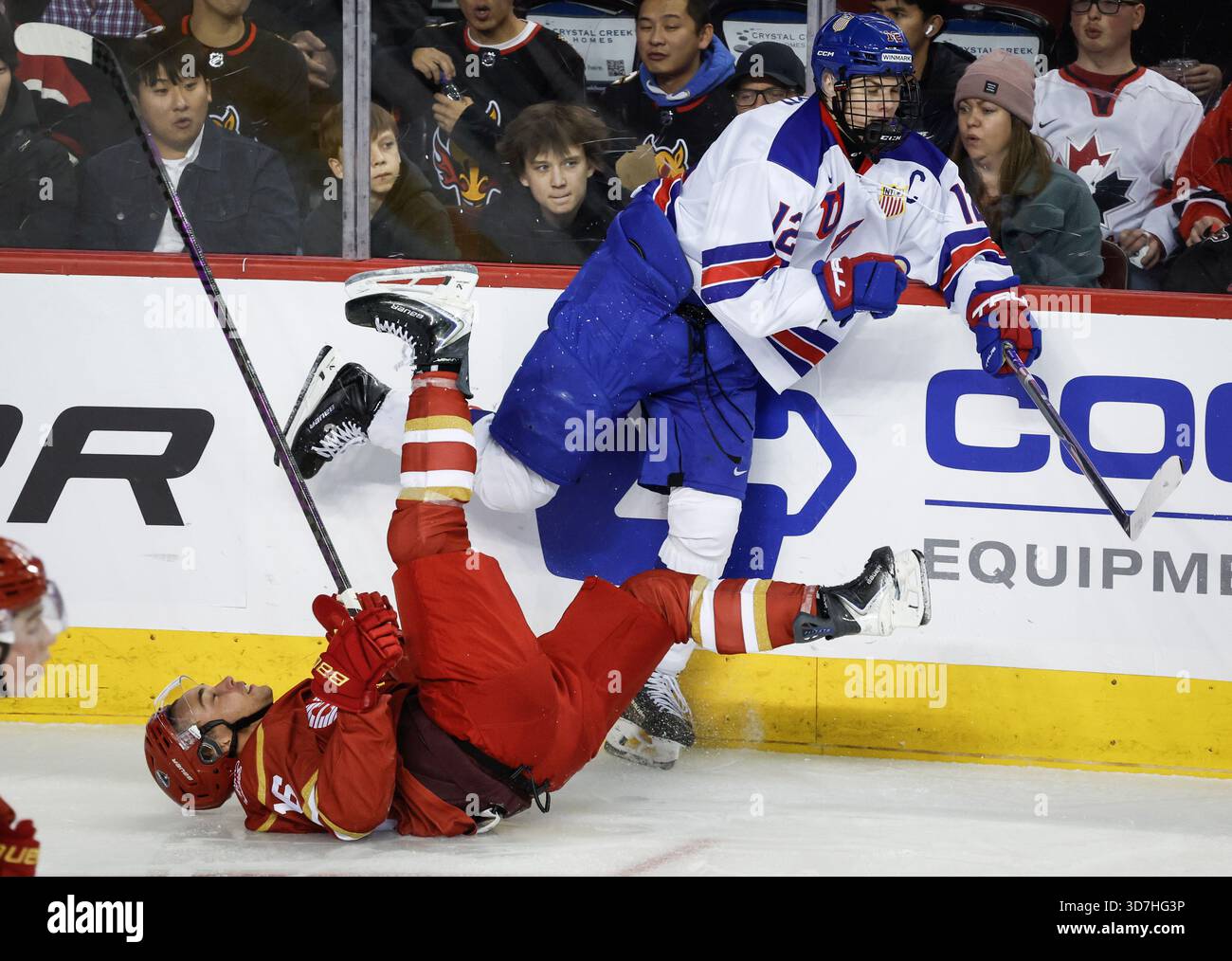 Team USA's Casey Mutryn, right, checks Team CHL's Adam Novotny during ...