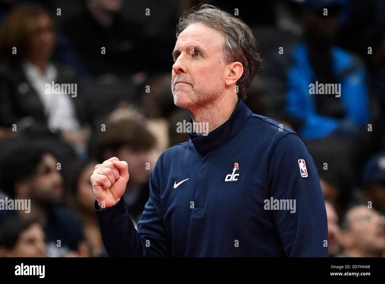 Washington Wizards head coach Brian Keefe checks the scoreboard during ...