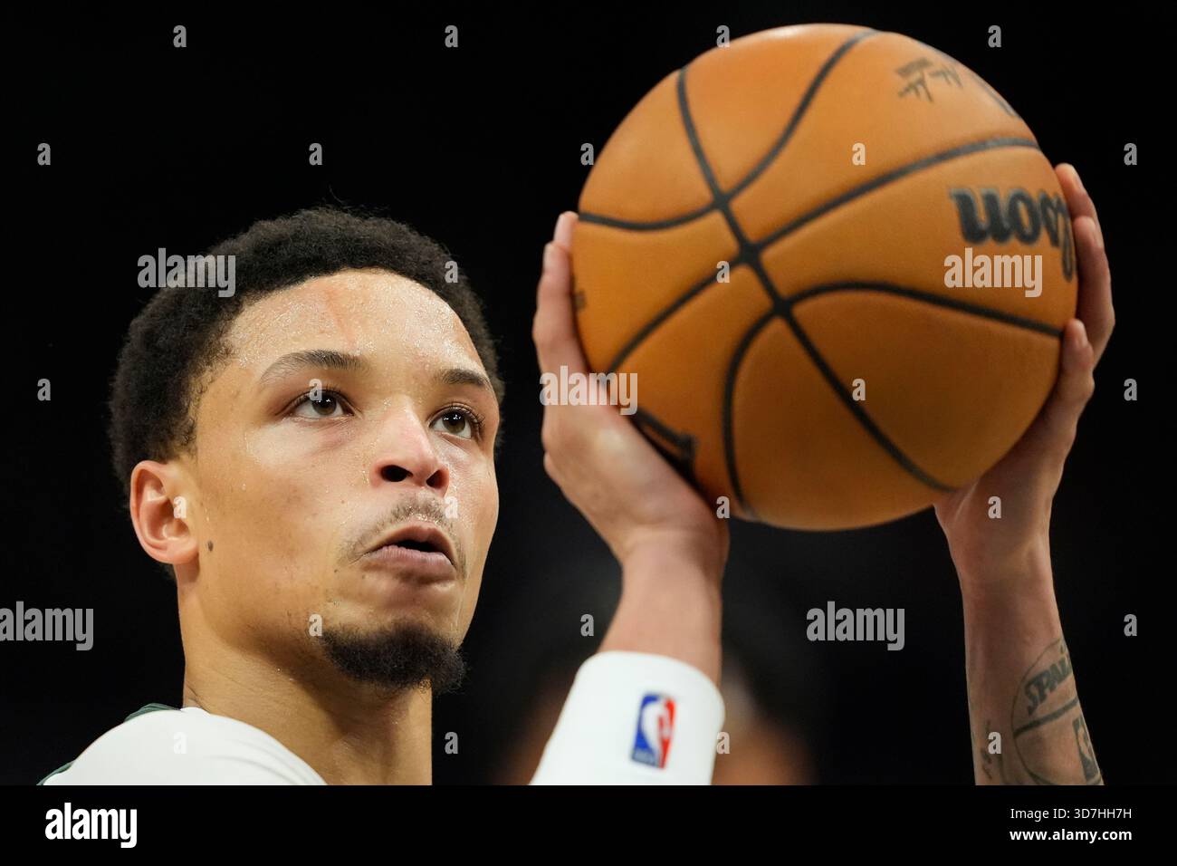 Milwaukee Bucks' Ryan Rollins shoots a free throw during an NBA ...