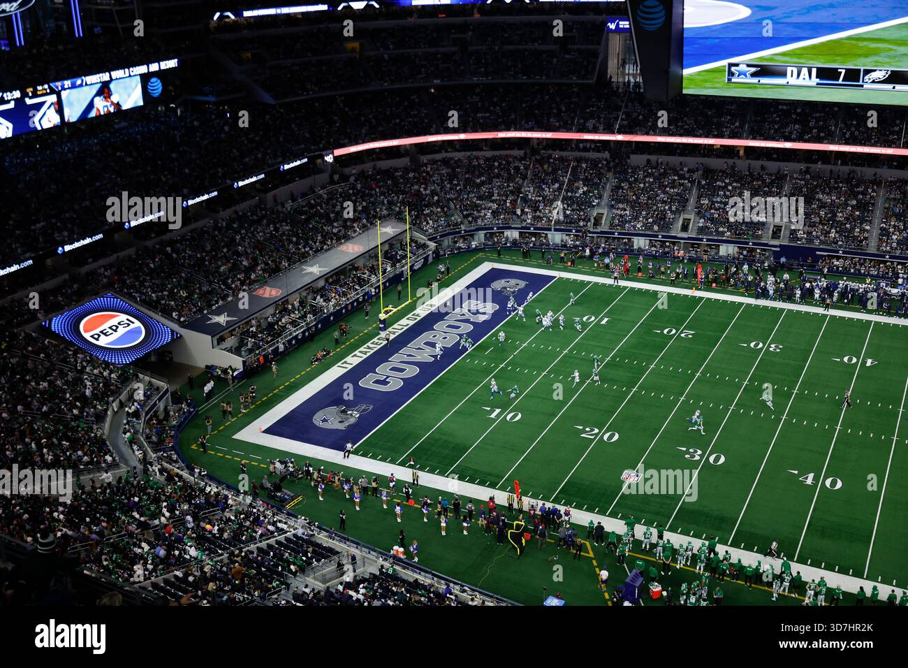The end zone of AT&T Stadium with the 'It Takes All Of Us" painted on ...