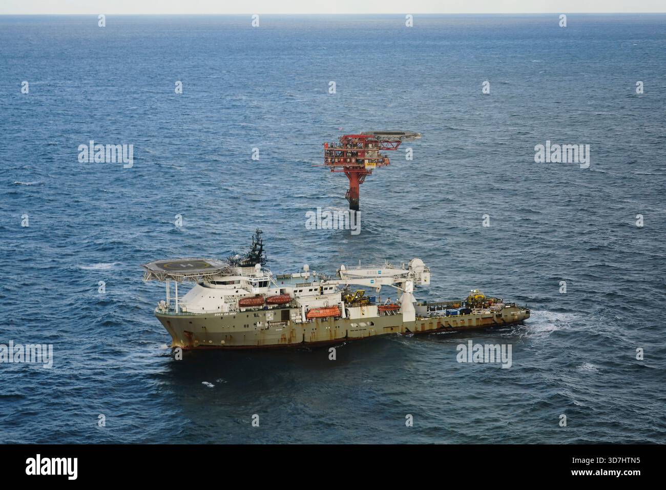 The Nini oil field and a vessel are seen from a helicopter above the ...