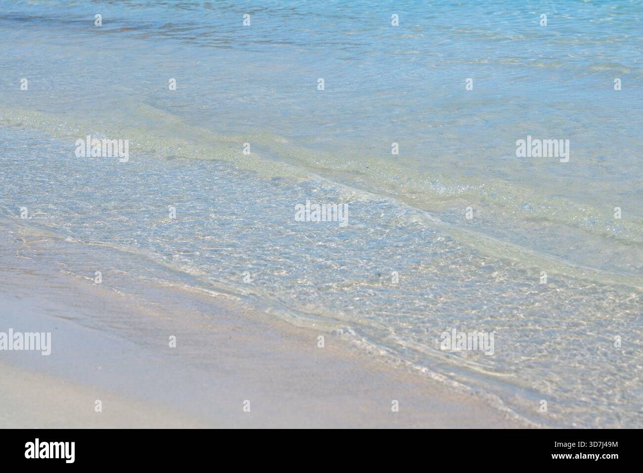 Transparent sea waves revealing sandy hi-res stock photography and ...